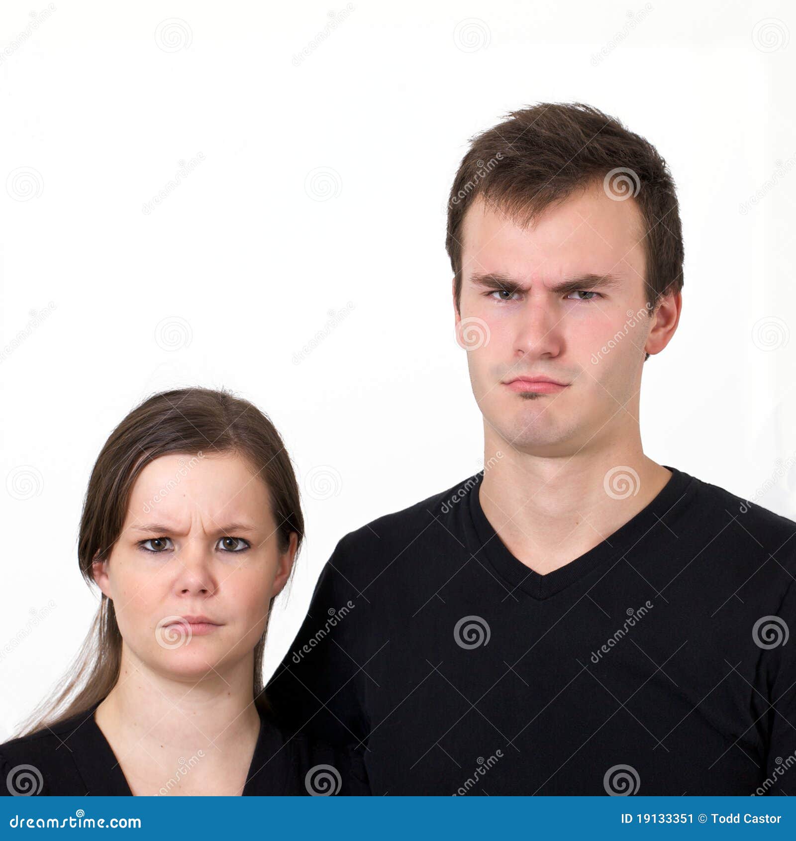Couple S Serious Expressions Stock Image - Image of shot, young: 19133351