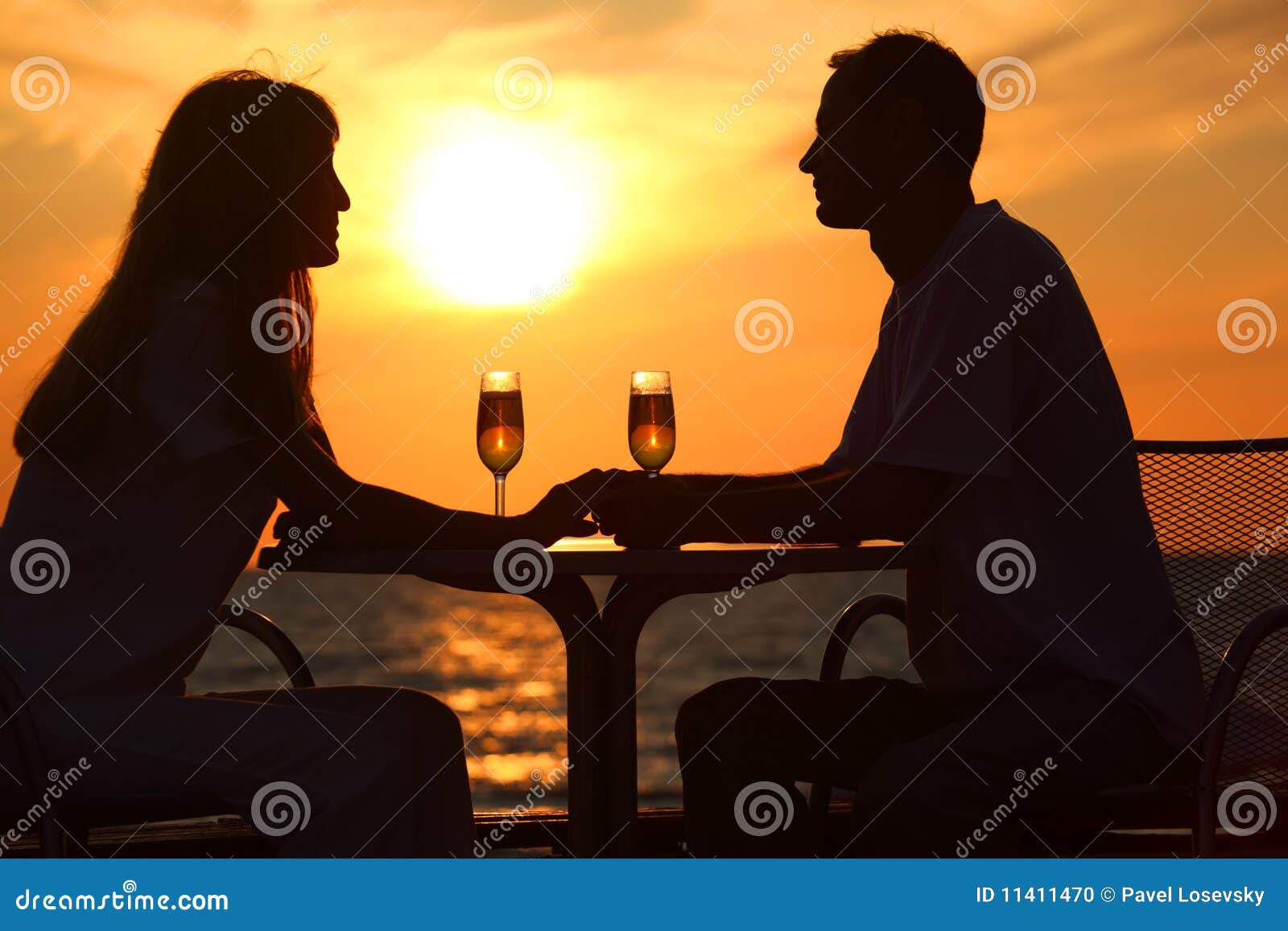 Couple S Silhouettes on Sunset Sit at Table Stock Photo - Image of ...