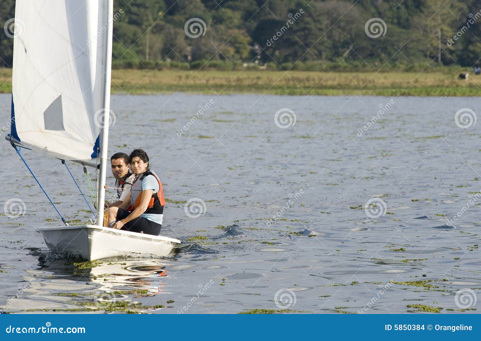 Couple Sailing Across Lake - Horizontal Stock Photo - Image of nature ...