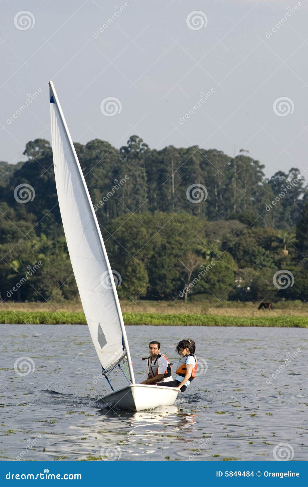 Couple Sailing - Vertical stock photo. Image of sailing - 5849484