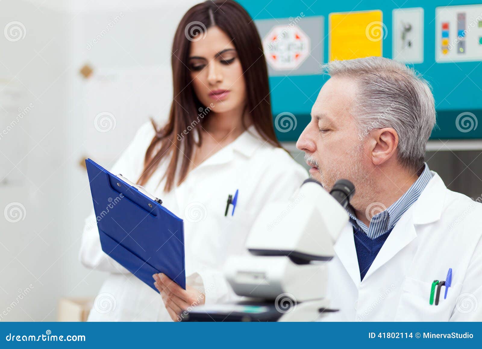 Couple of Scientist in a Laboratory Stock Photo - Image of blue, cell ...