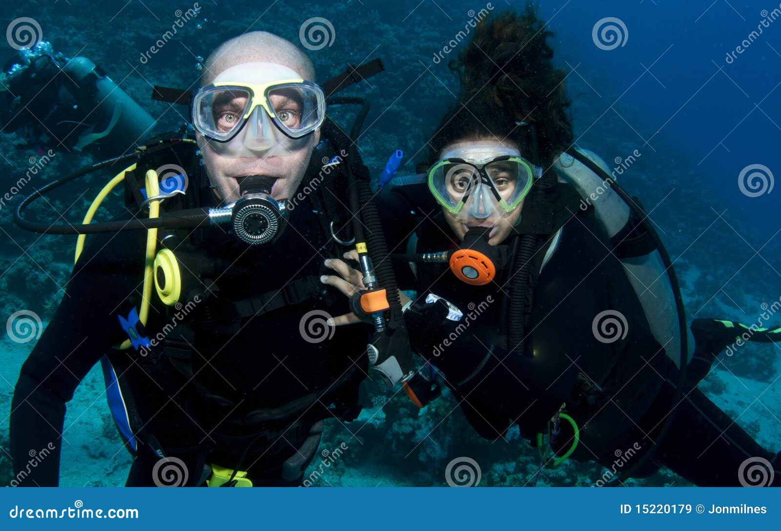 Couple scuba diving stock image. Image of activity, colourful - 15220179