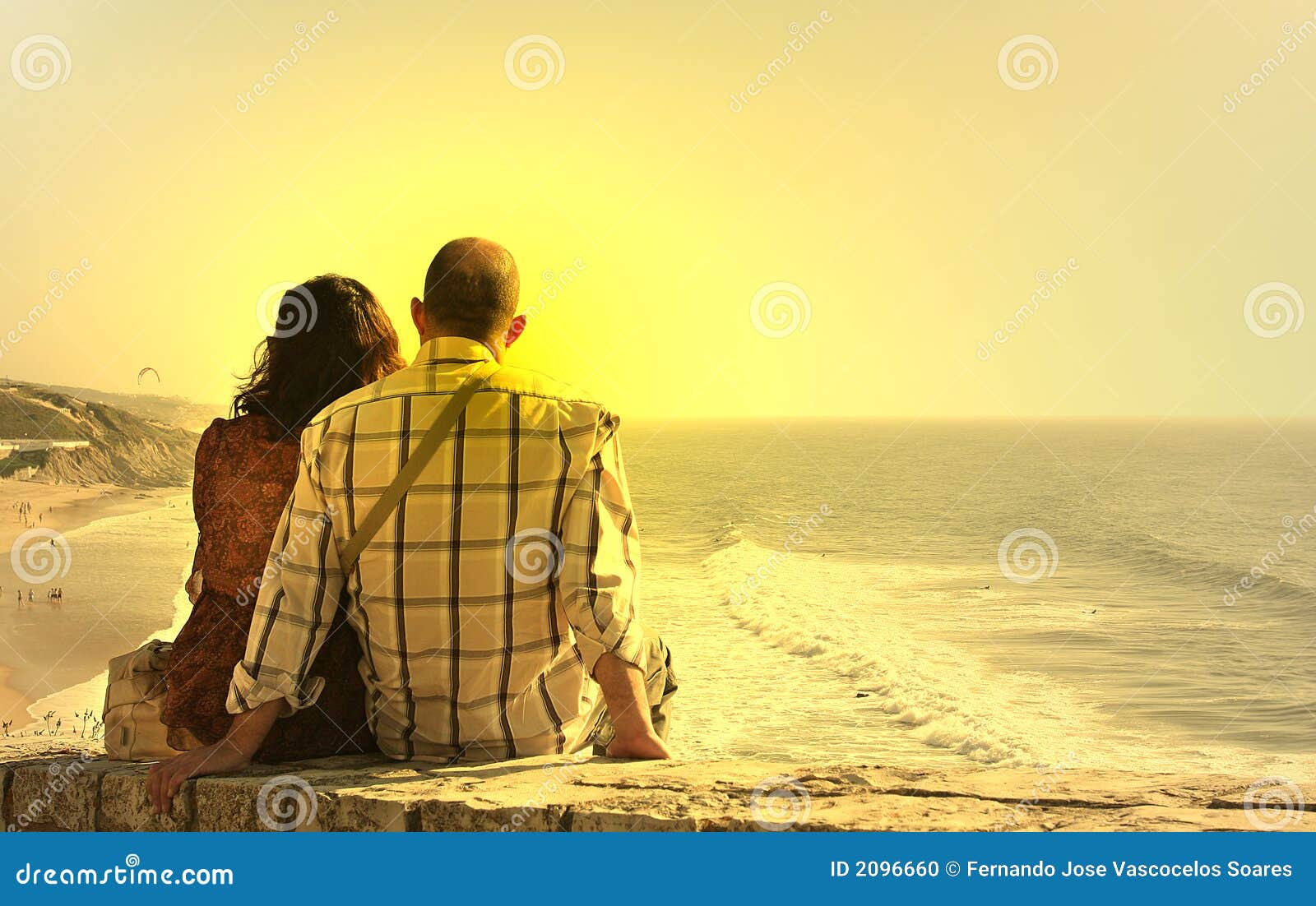 Couple Seated Watch the Sunset Stock Photo - Image of sunset, hands ...