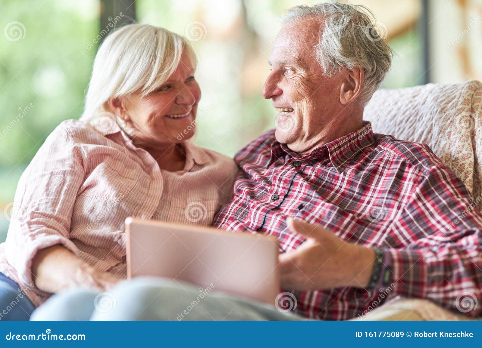 Couple of Seniors is Having Fun with the Tablet Computer Stock Image ...