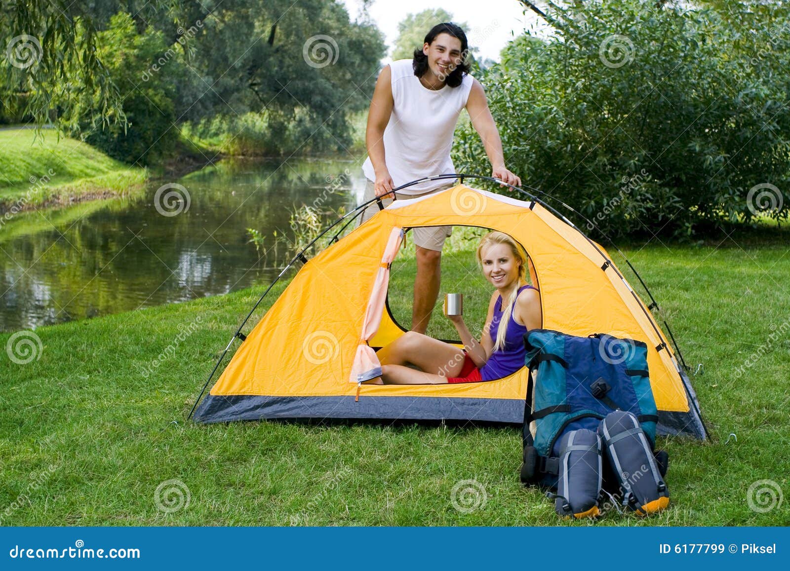 Couple setting up tent stock image. Image of camping, escape - 6177799