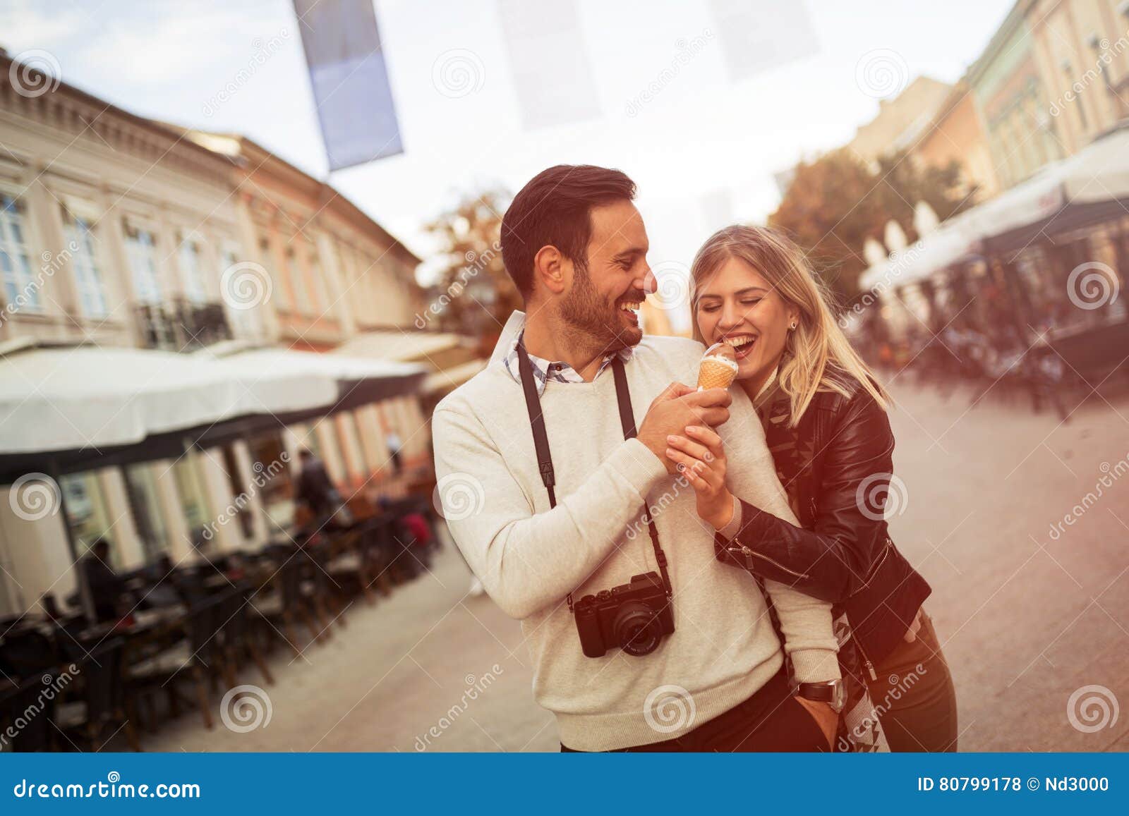 Couple Sharing Ice Cream Outdoors Stock Photo - Image of enjoying ...