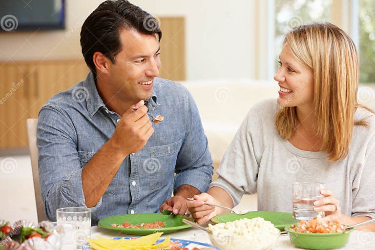 Couple sharing meal stock photo. Image of chatting, nutrition - 55893226