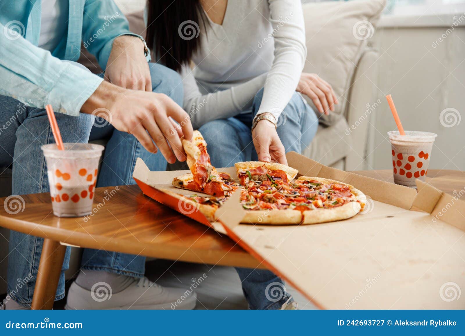 Couple Sharing Pizza and Eating Stock Image - Image of slice, lifestyle ...