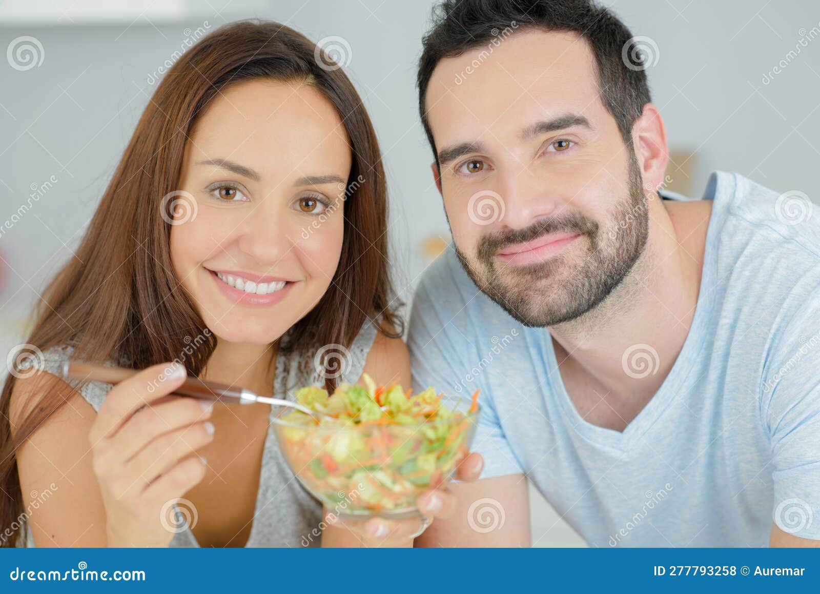 Couple sharing salad stock photo. Image of couple, salad - 277793258