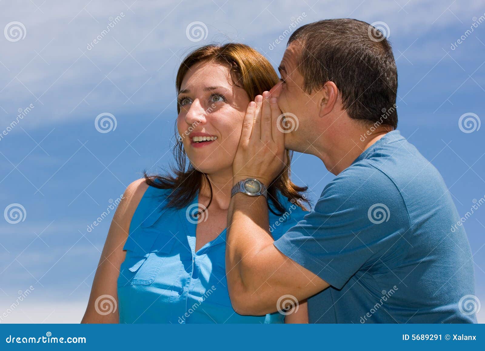 Couple sharing secrets stock image. Image of couple, lips - 5689291