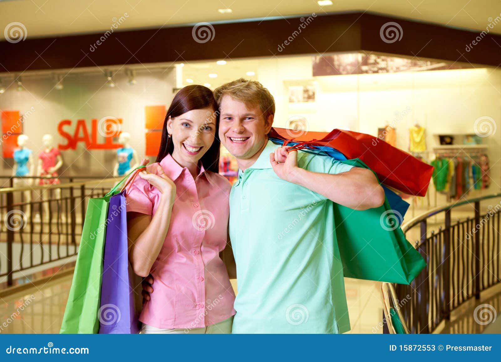 Couple of shopaholics stock image. Image of happy, glad - 15872553