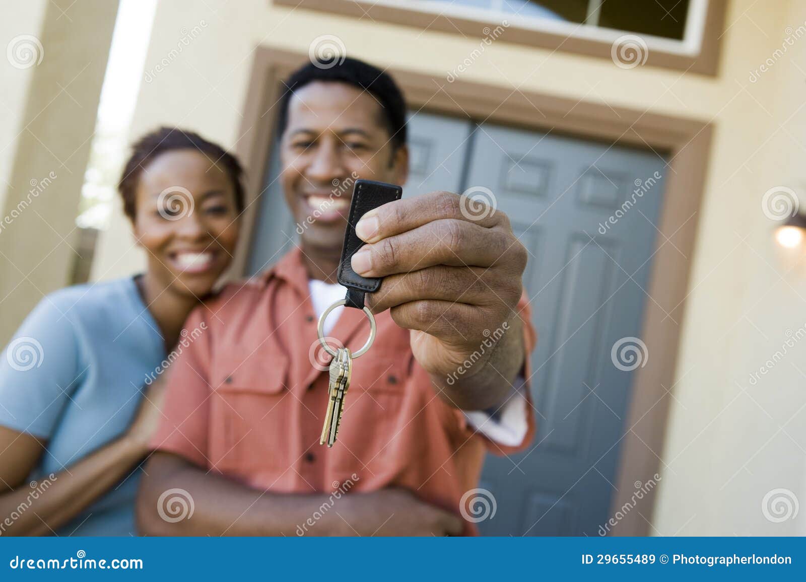 Couple Showing a Pair of House Keys Stock Image - Image of looking ...