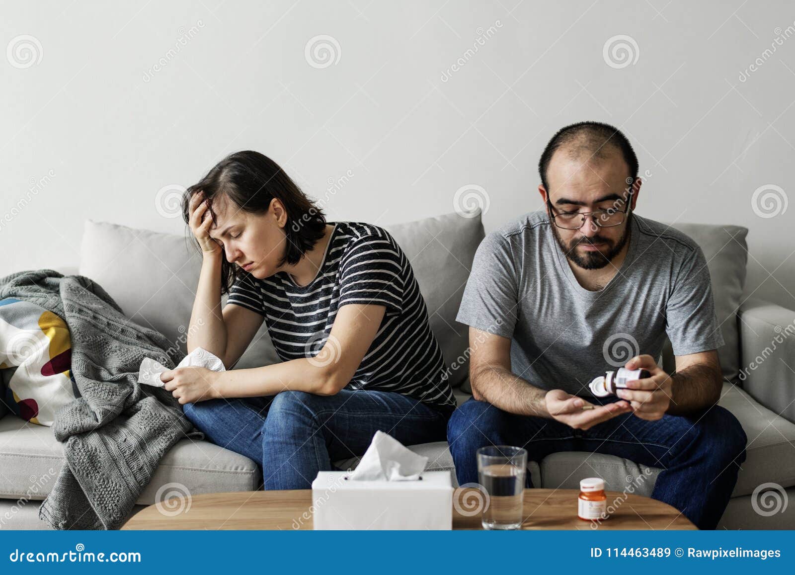 Couple Sick at Home on the Sofa Stock Image - Image of american ...