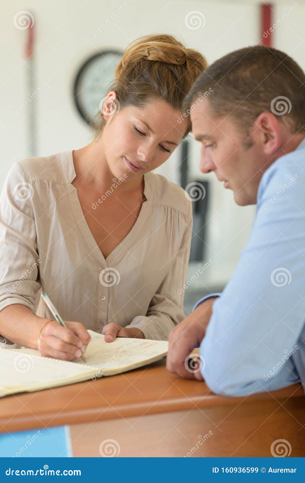 Couple signing book stock image. Image of light, open - 160936599