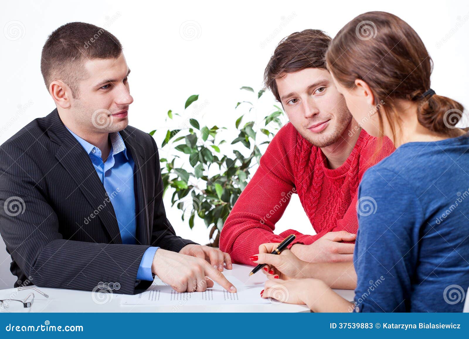 Couple Signing the Mortgage Agreement Stock Image - Image of elegant ...