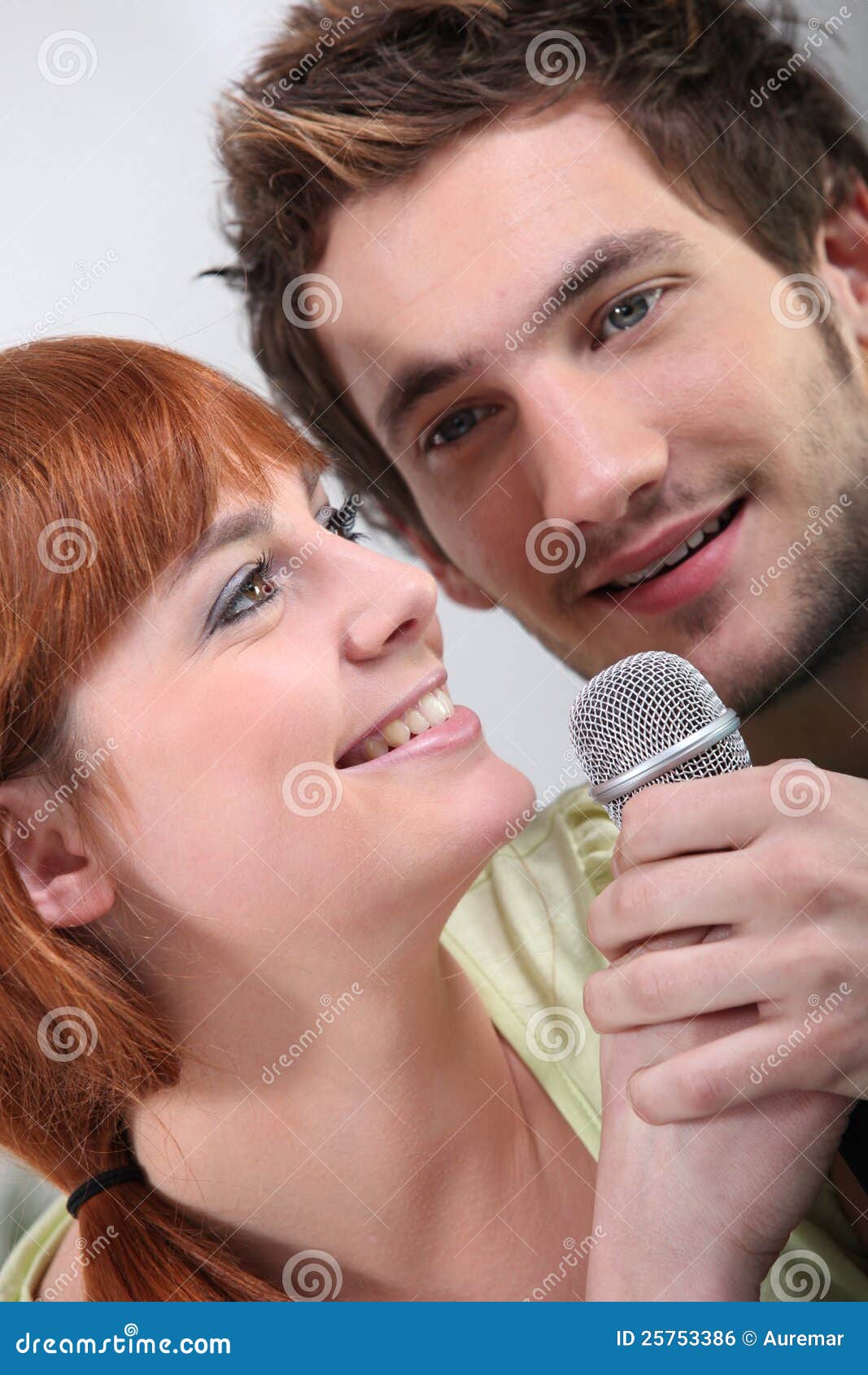 Couple singing karaoke stock photo. Image of party, nightclub - 25753386