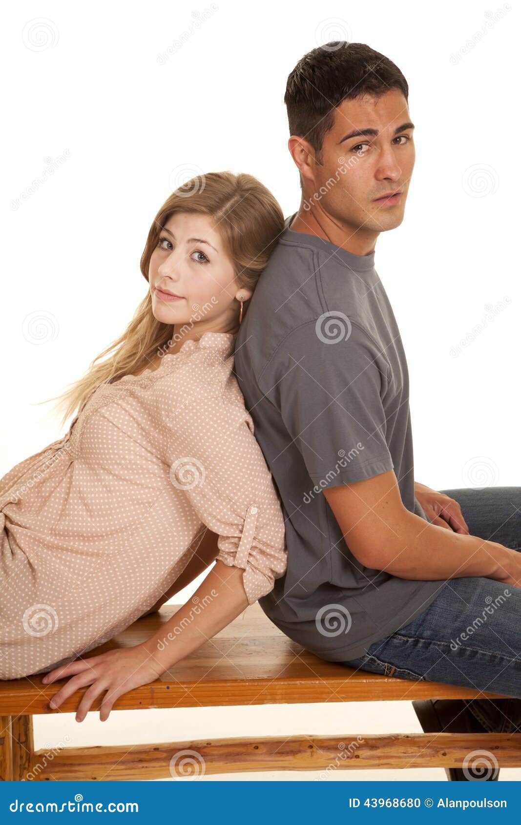 Couple Sit Back To Back Both Looking Serious Stock Photo - Image of ...