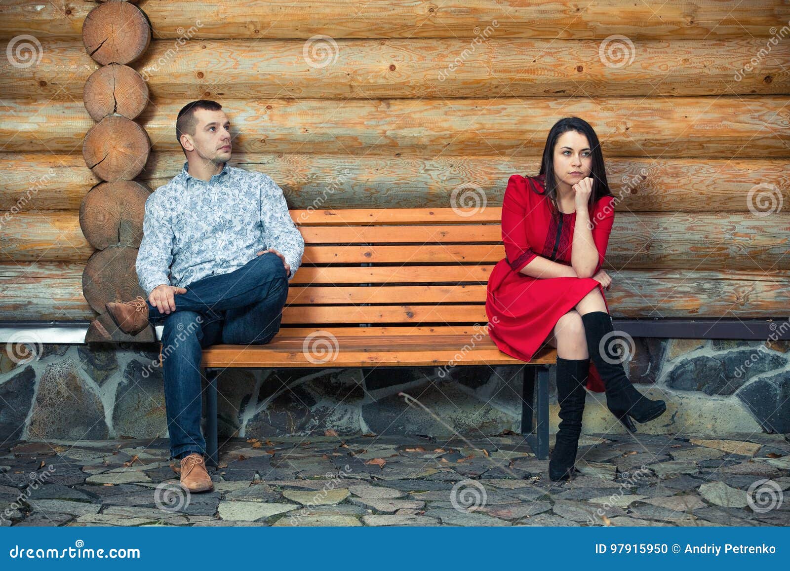 People Sitting Apart On A Bench