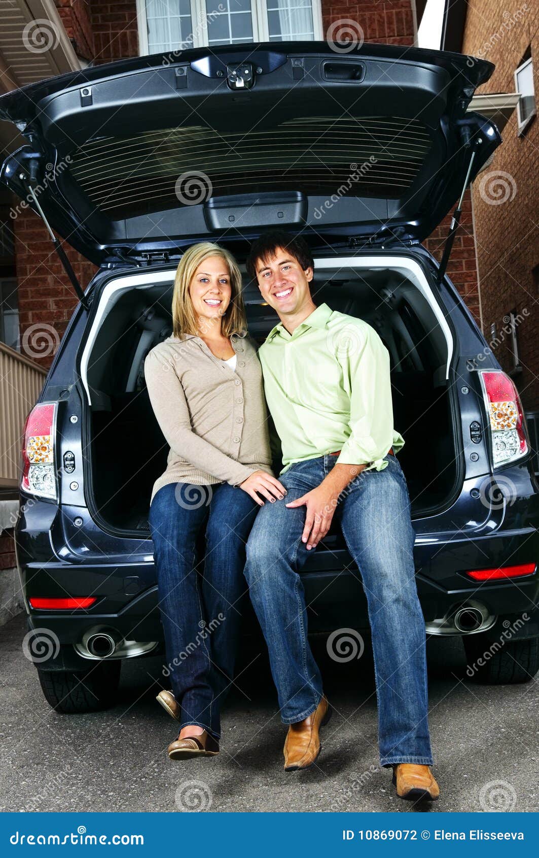 Couple Sitting in Back of Car Stock Photo - Image of happiness, getaway ...