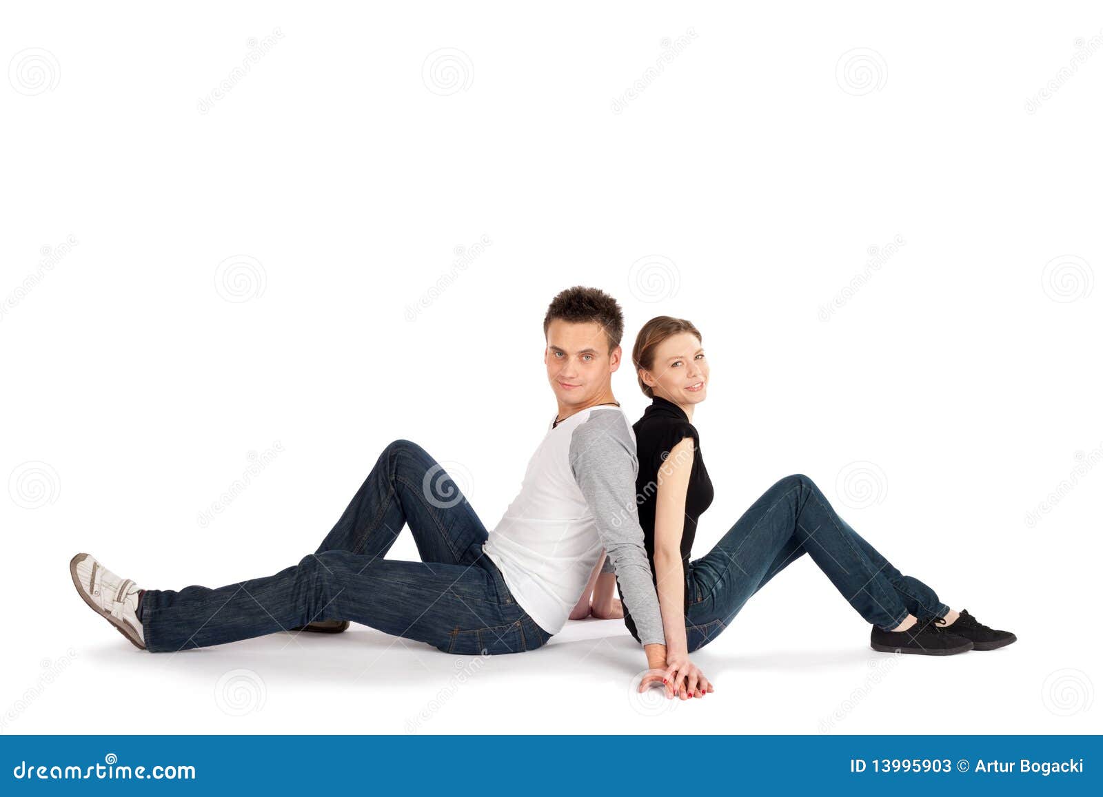 Couple Sitting Back To Back Stock Image - Image of clothing, pair: 13995903
