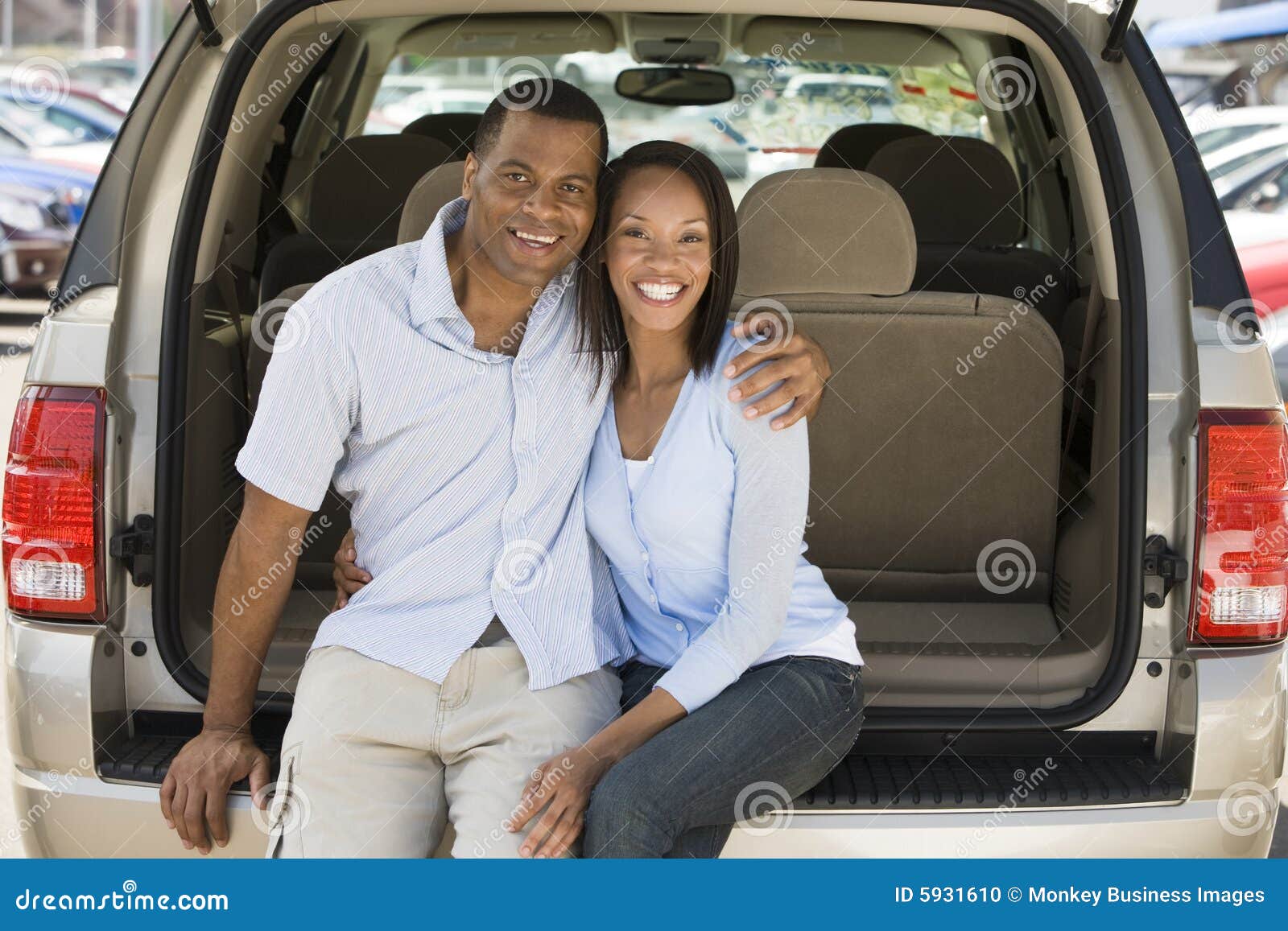 Couple Sitting in Back of Van Smiling Stock Photo - Image of outside ...