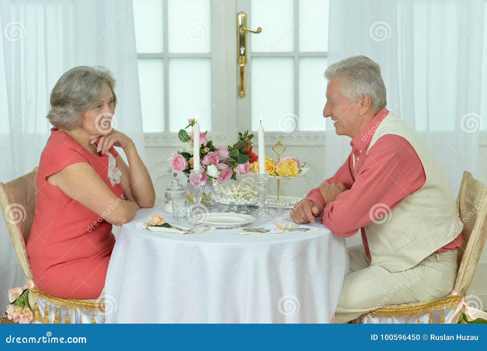 Couple Sitting at Dining Table Stock Photo - Image of happiness, male ...