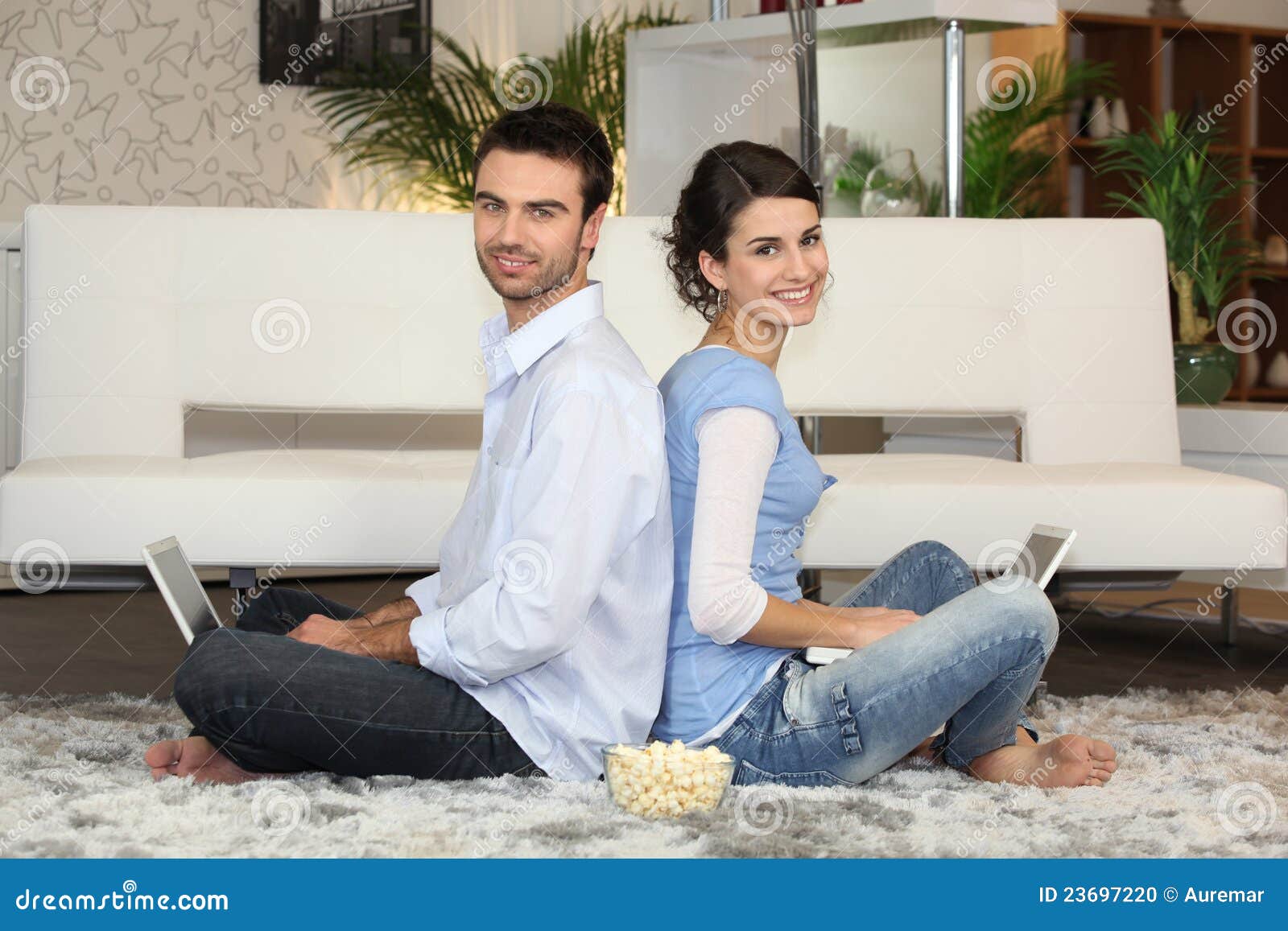 Couple Sitting with Laptop Computers Stock Photo - Image of popcorn ...