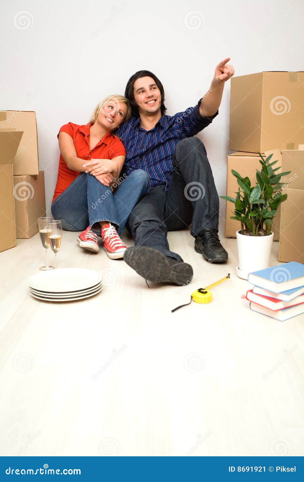 Couple sitting in new home stock image. Image of lifestyle - 8691921