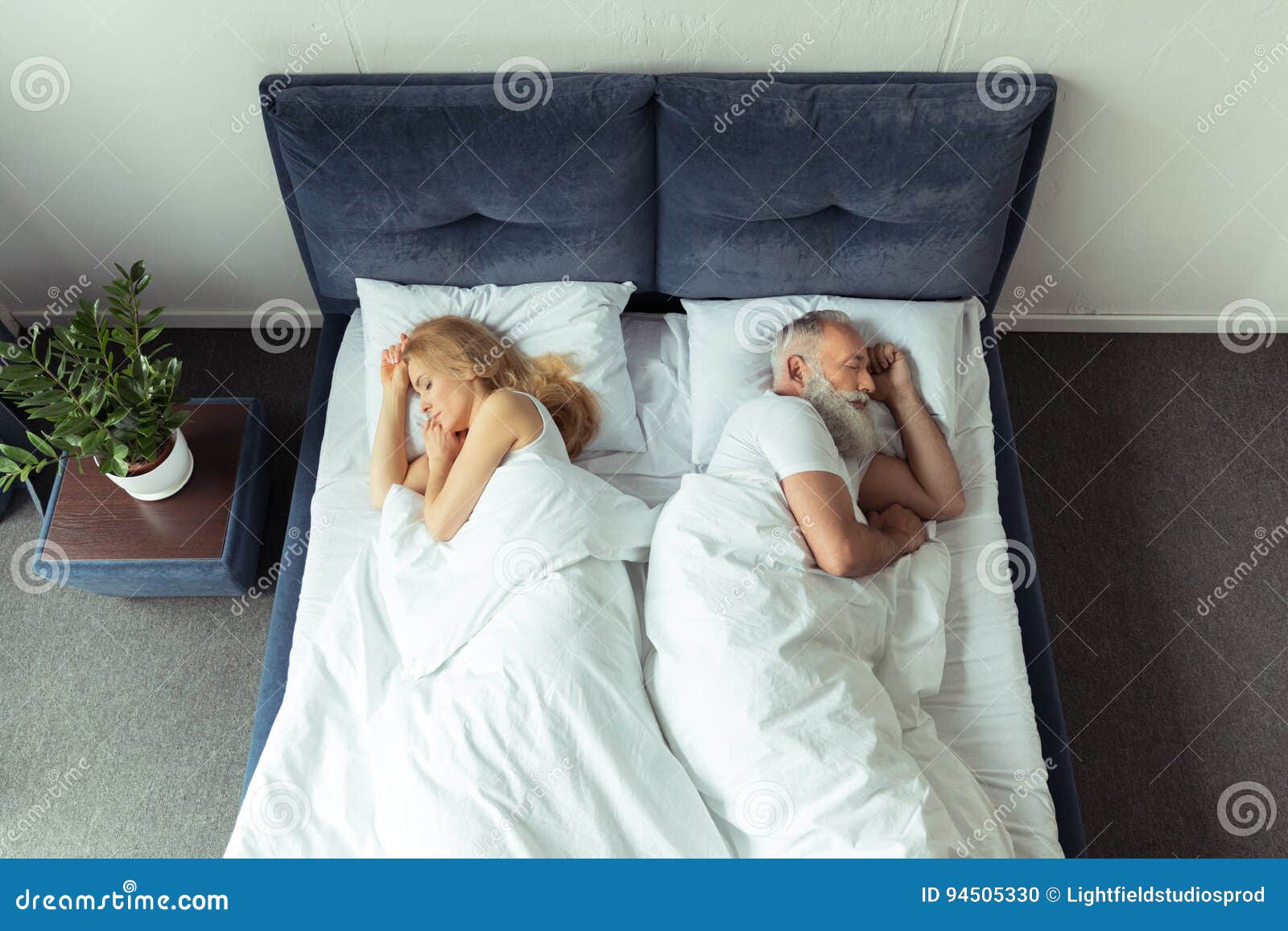Couple Sleeping Back To Back in Bed Stock Photo - Image of comfortable ...