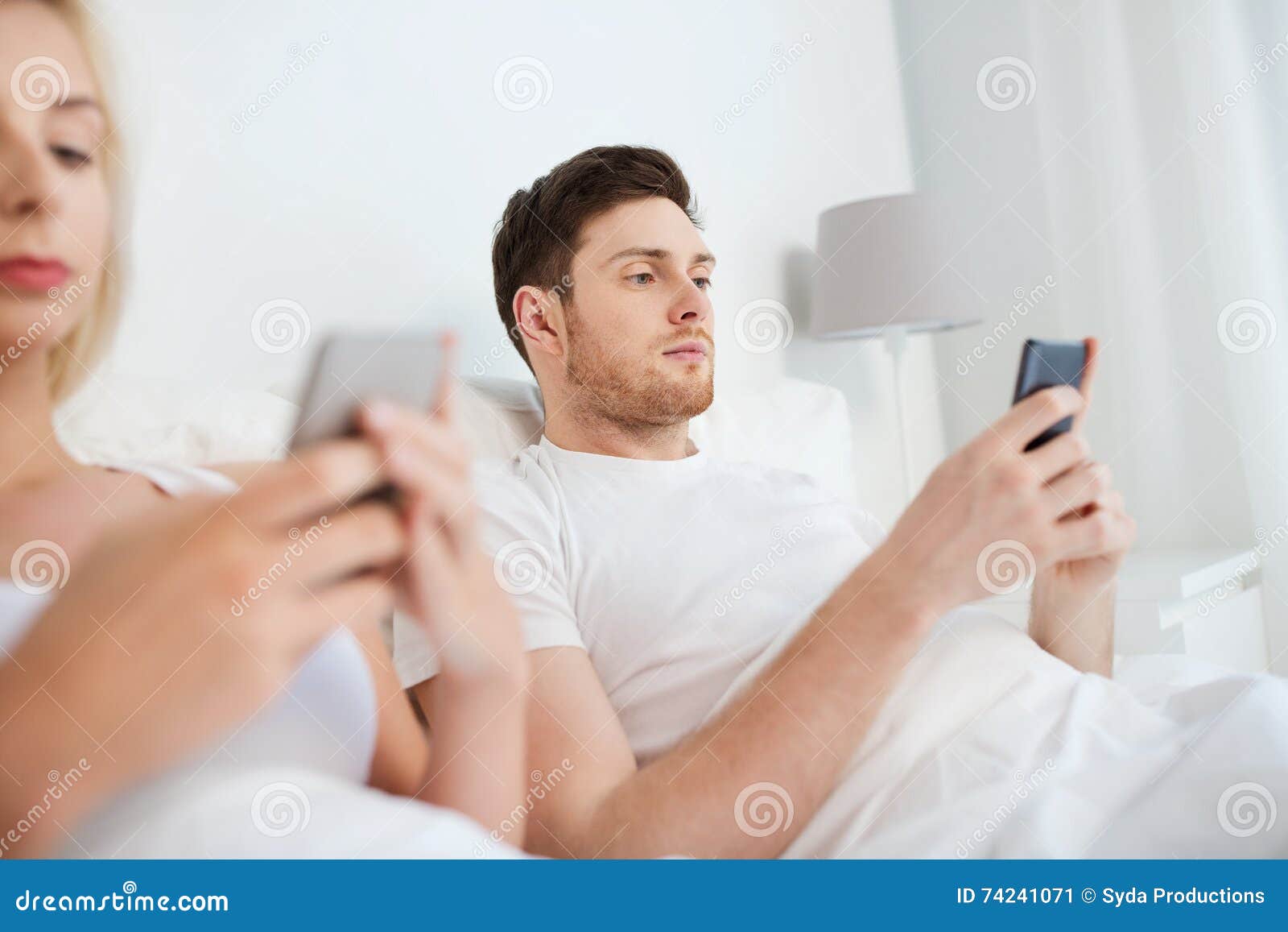 Couple with Smartphones in Bed Stock Image - Image of networking, lover ...