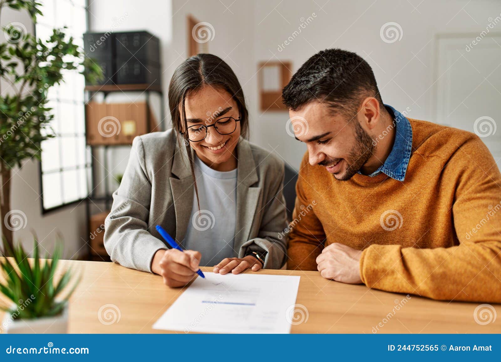Couple Smiling Happy Reading Document at the Office Stock Image - Image ...
