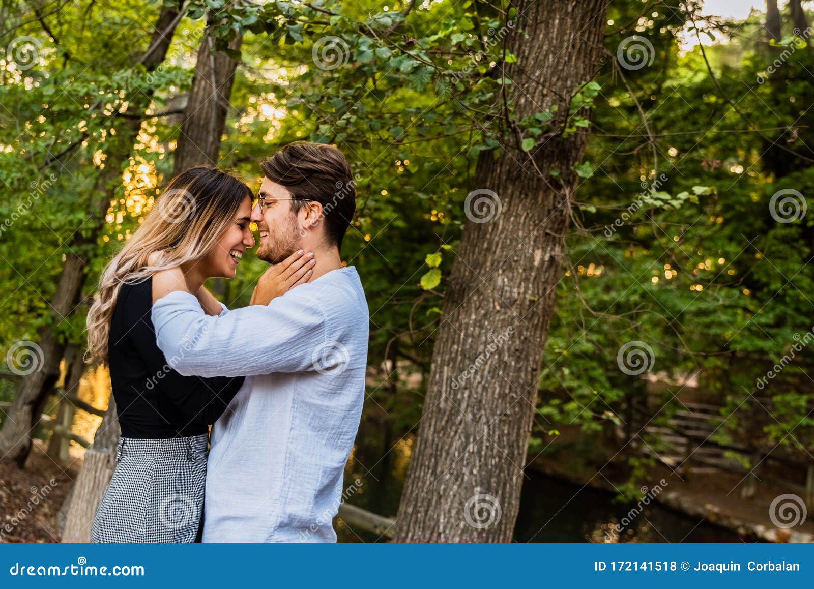 Couple of Smiling Lovers Walk in a Park Stock Photo - Image of male ...