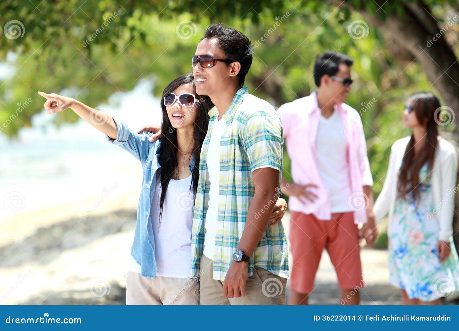 Couple Smiling Together Having Fun with Friends Stock Photo - Image of ...