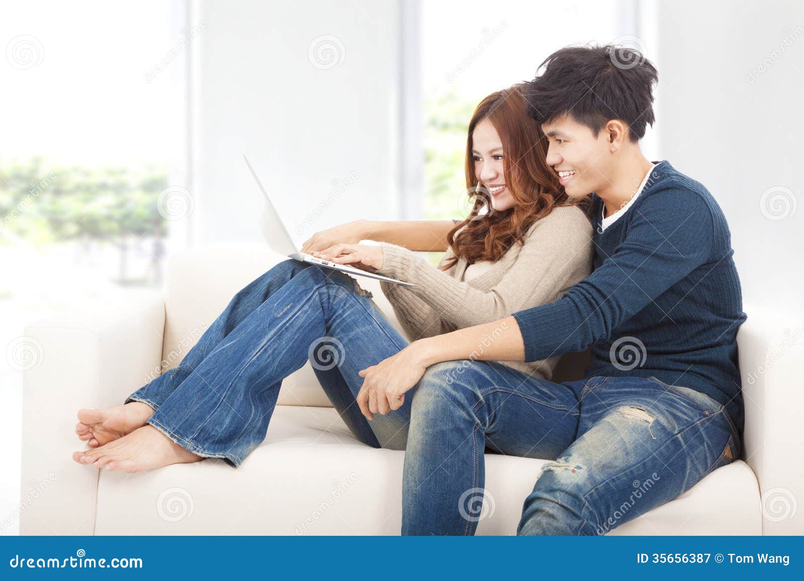 Couple in Sofa with Laptop Pc Computer at Home Stock Image - Image of ...