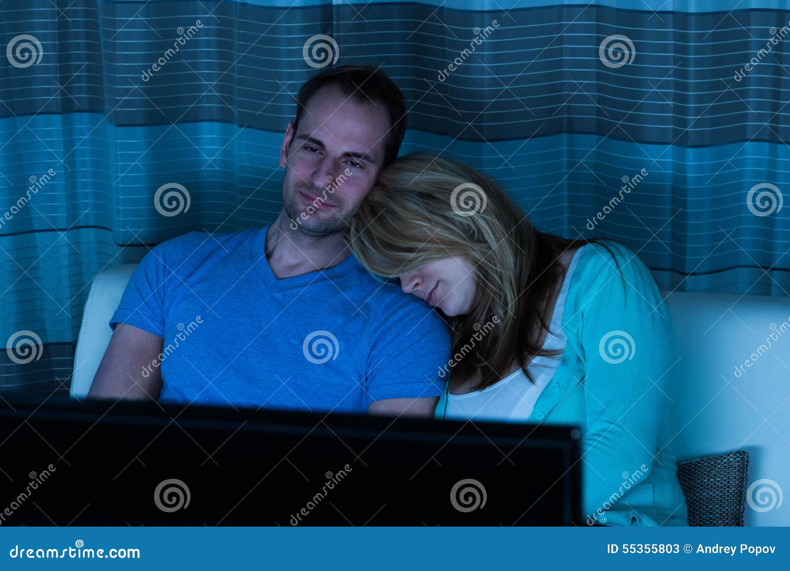 Couple on Sofa Watching Television Stock Image - Image of male ...