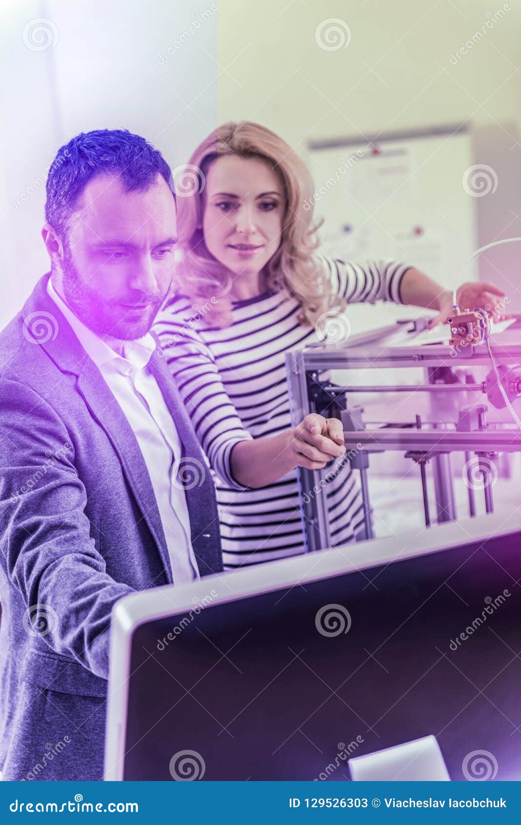 Couple of Software Engineer Feeling Involved in Watching New Device ...