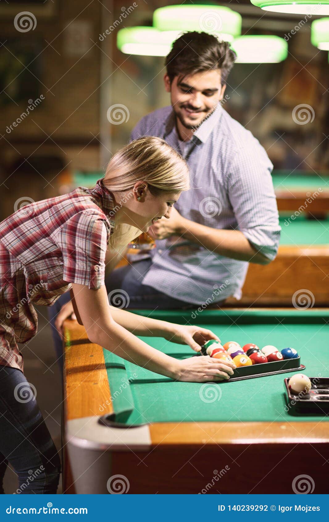 Couple Sorting Balls for Beginning Billiard Game Stock Photo - Image of ...