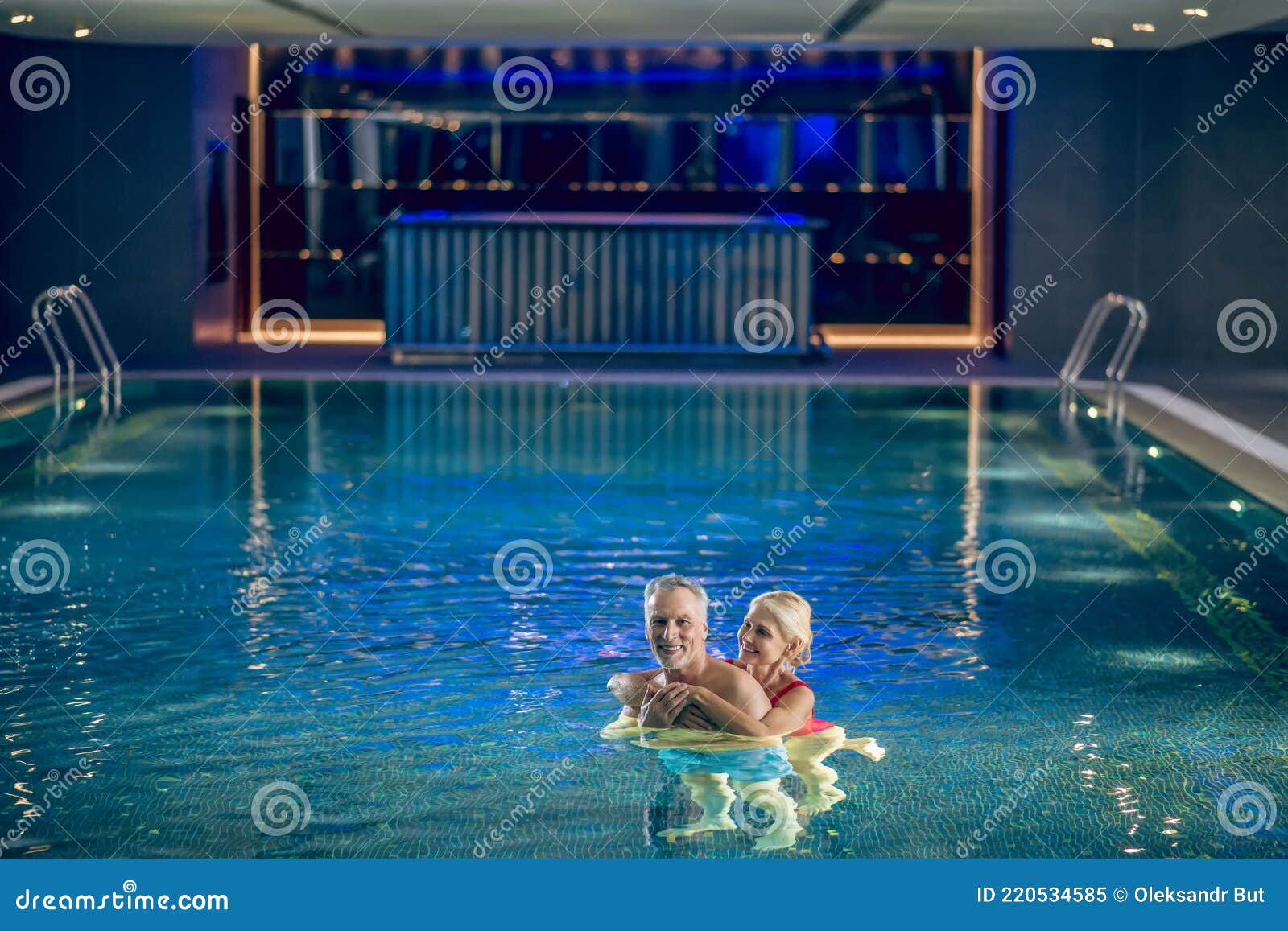 Couple Spending Time in a Swimming Pool and Looking Romantic Stock ...