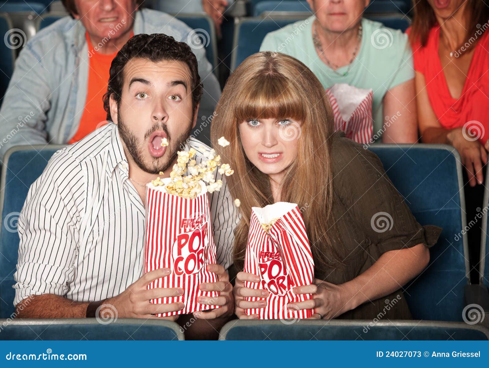 Couple Spills Their Popcorn Stock Image - Image of male, frightened ...