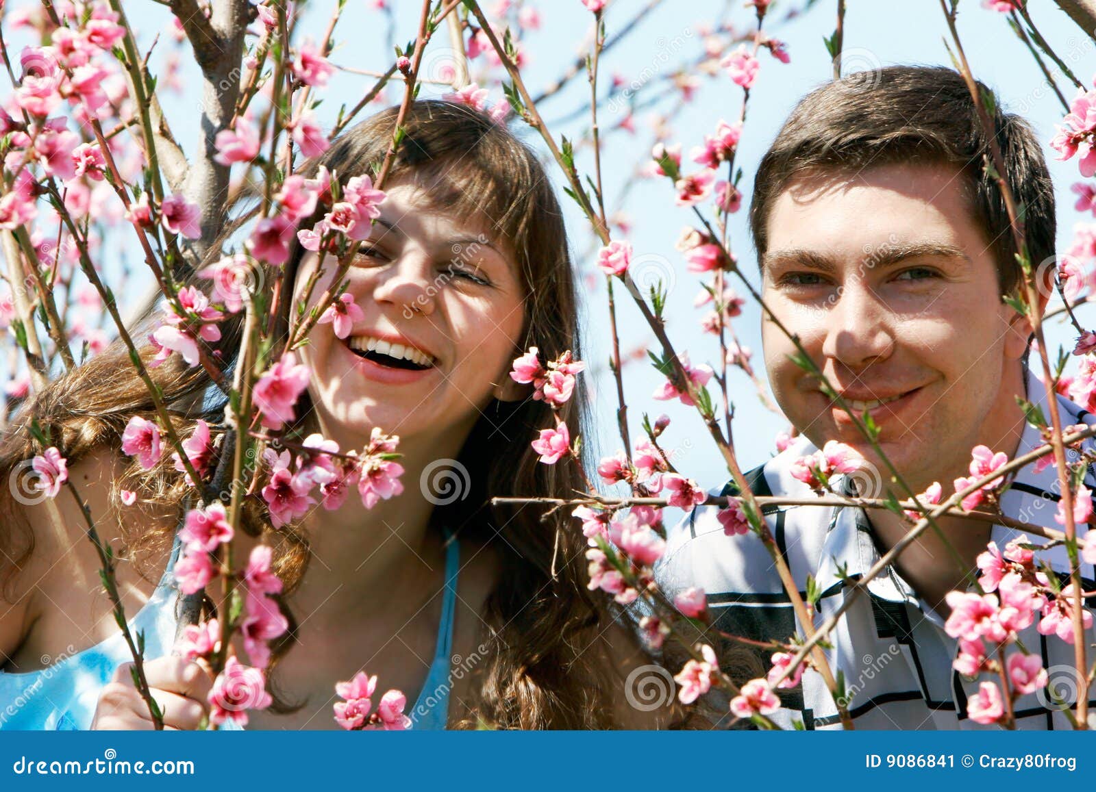 Couple in spring garden stock image. Image of embrace - 9086841
