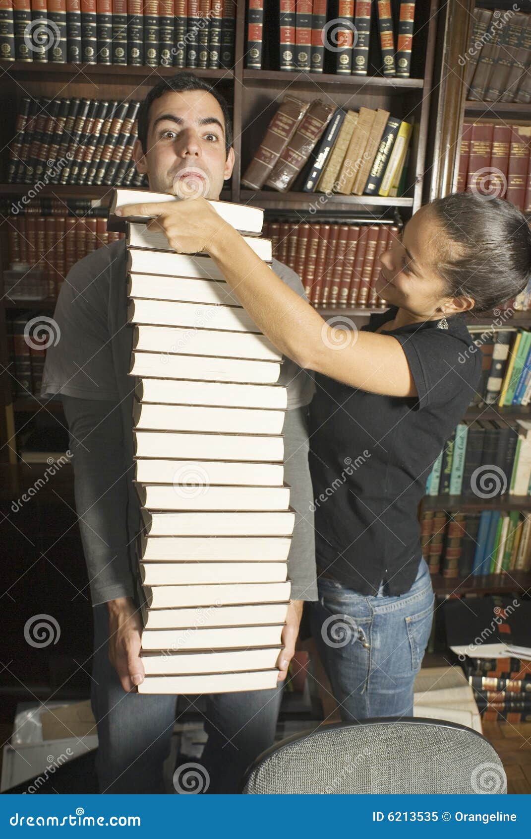 Stacking Books With Blur Bookshelfs Background In Library Room Royalty ...