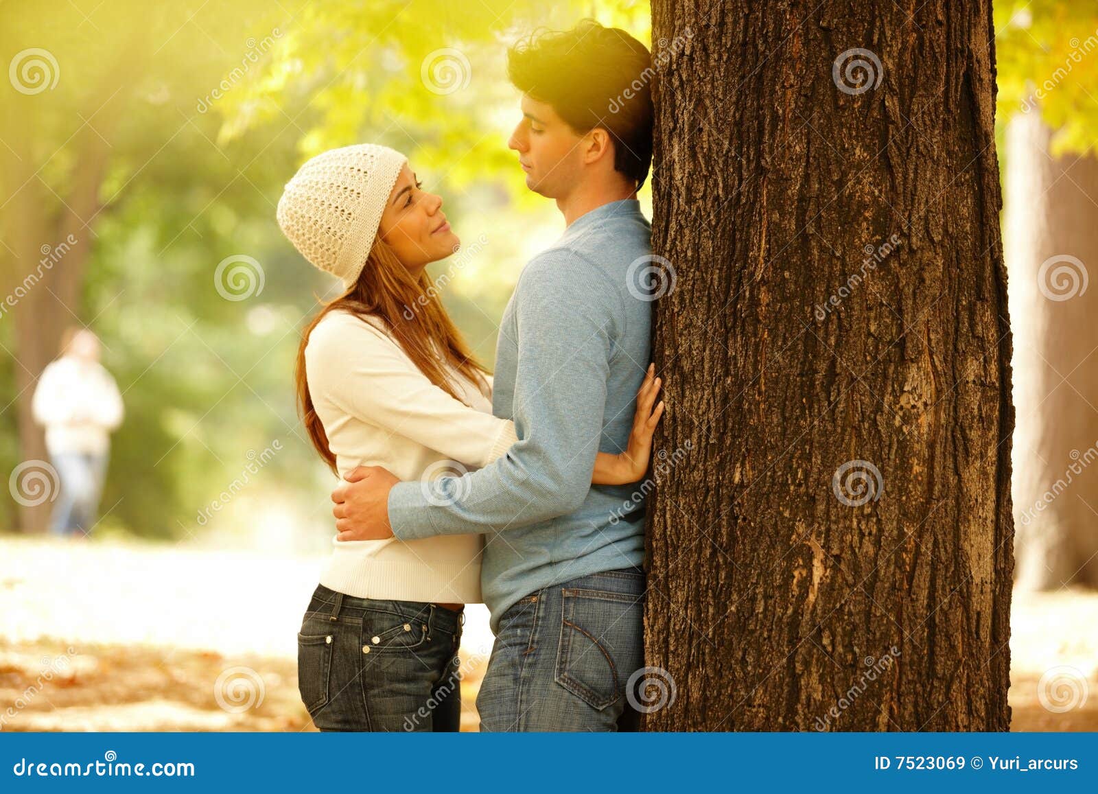 Couple Standing Against a Tree and Hugging Stock Image - Image of human ...