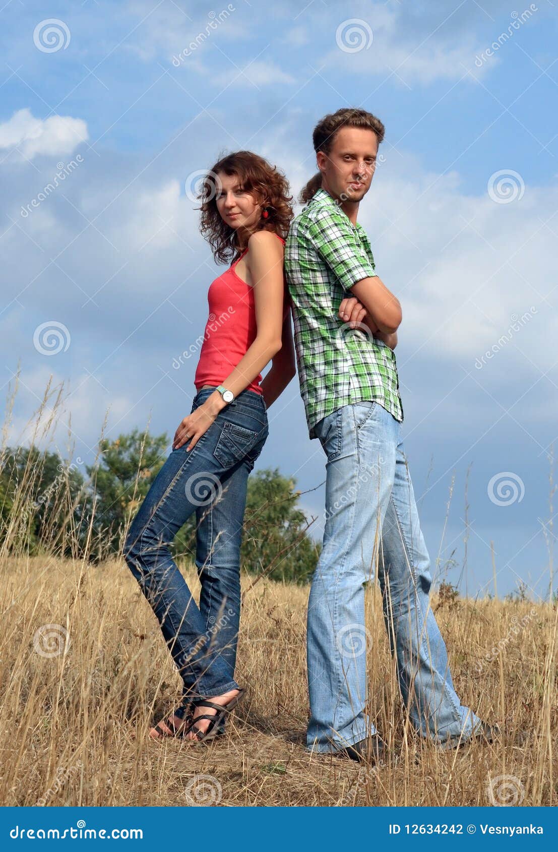 Couple Standing Back To Back Stock Photo - Image of model, cute: 12634242