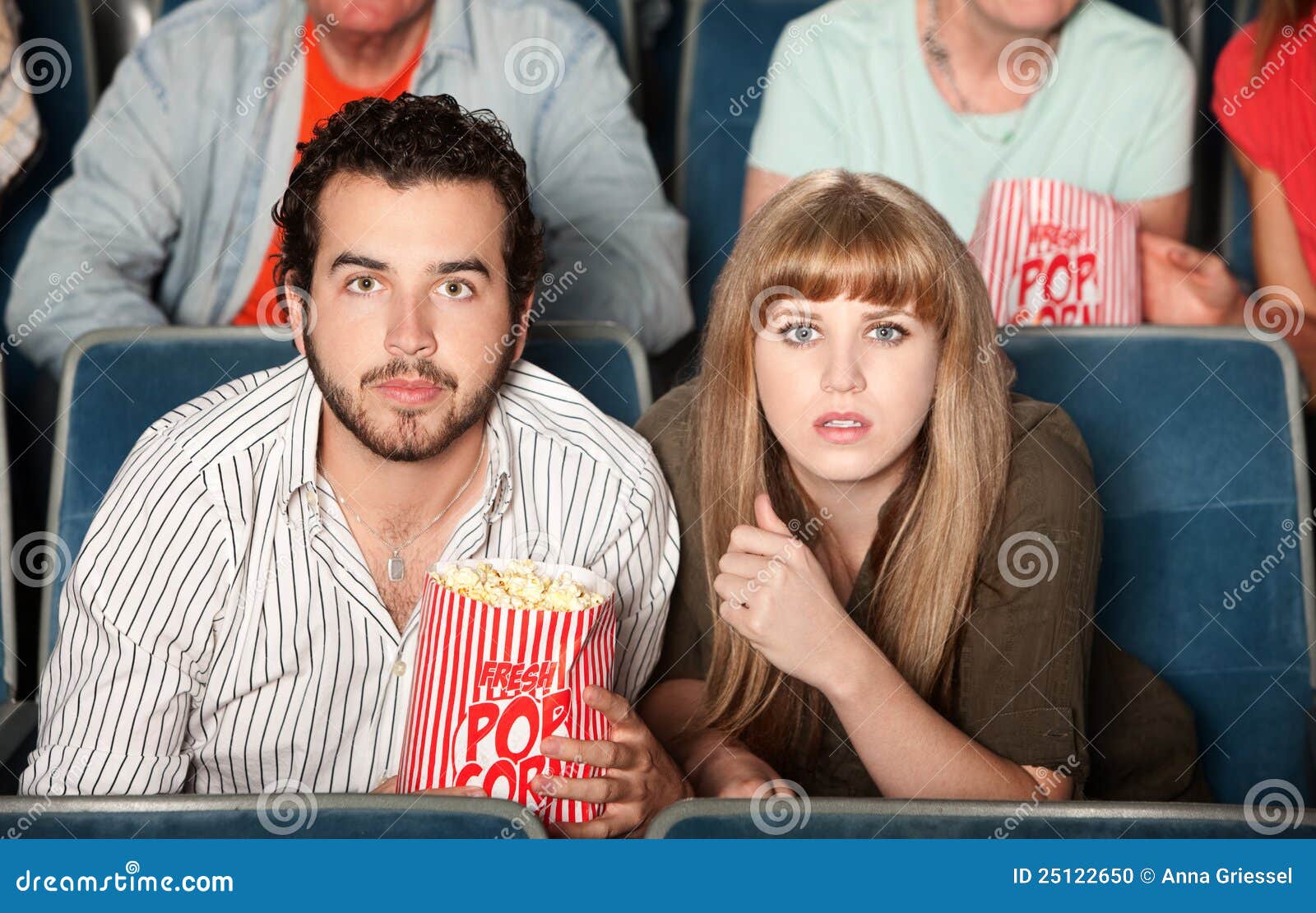 Couple Staring in Theater stock photo. Image of date - 25122650