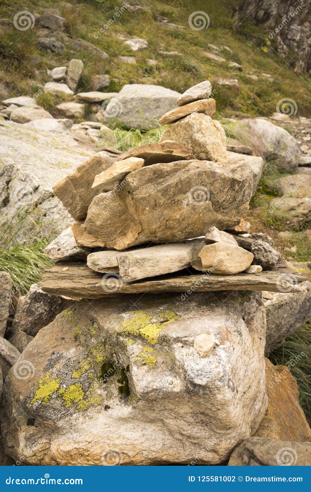 Rock Formation and Green Grass Stock Photo - Image of macro, outside ...