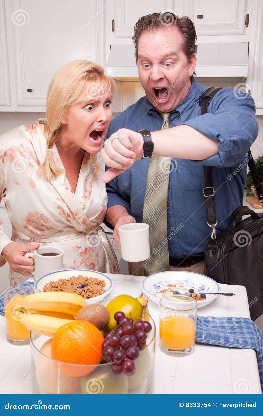 Couple Stressed Out in Kitchen Late for Work Stock Photo - Image of ...