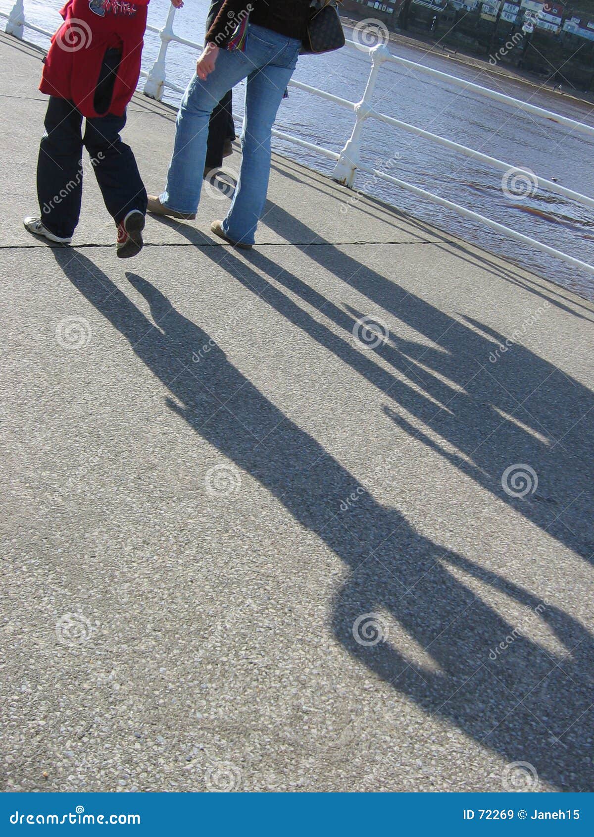 Couple strolling stock image. Image of walking, lesure, shadows - 72269