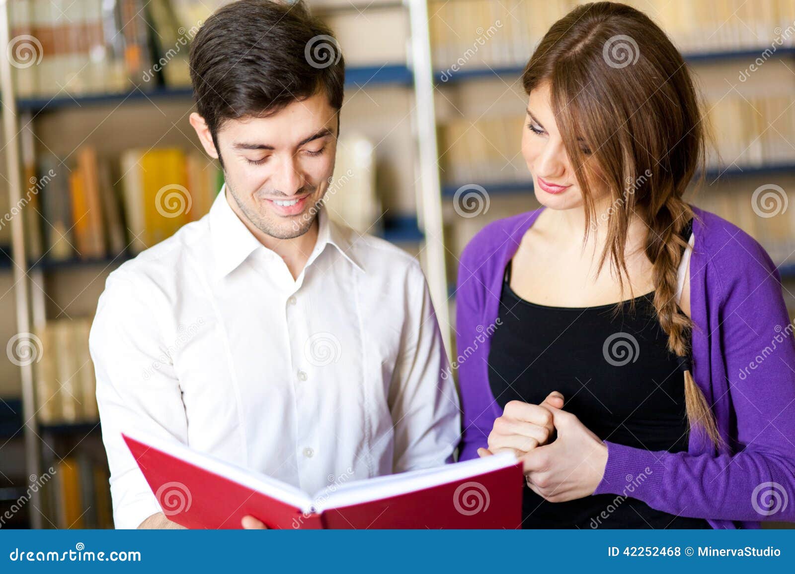 Couple of Students in a Library Stock Photo - Image of study, person ...