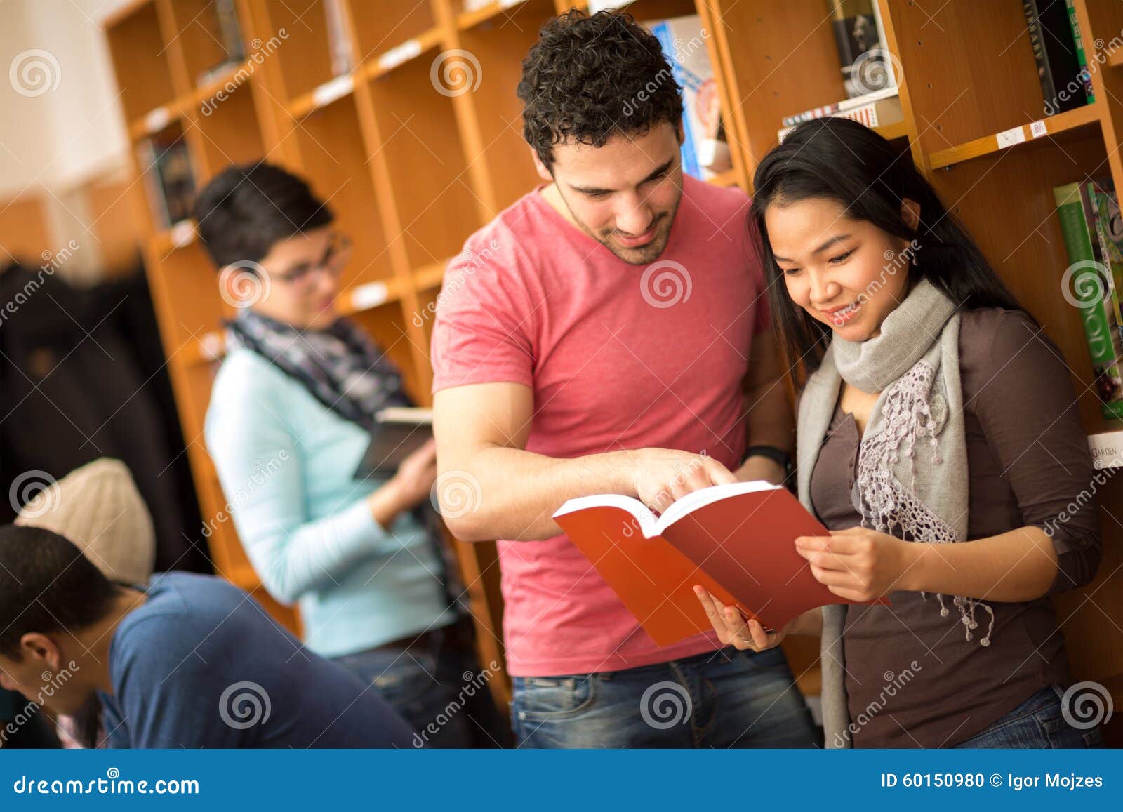 Couple of Students Reading Book Stock Photo - Image of friendship ...