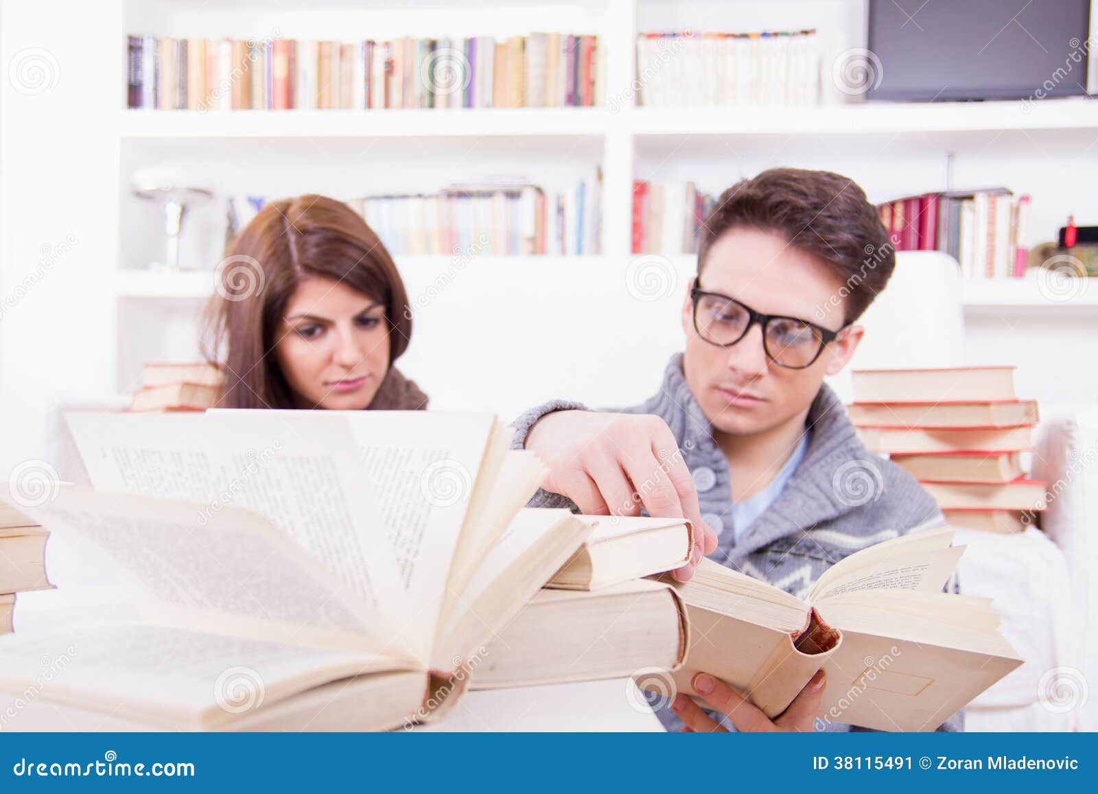 Couple Studying Together at Home with Lot of Books Stock Image - Image ...